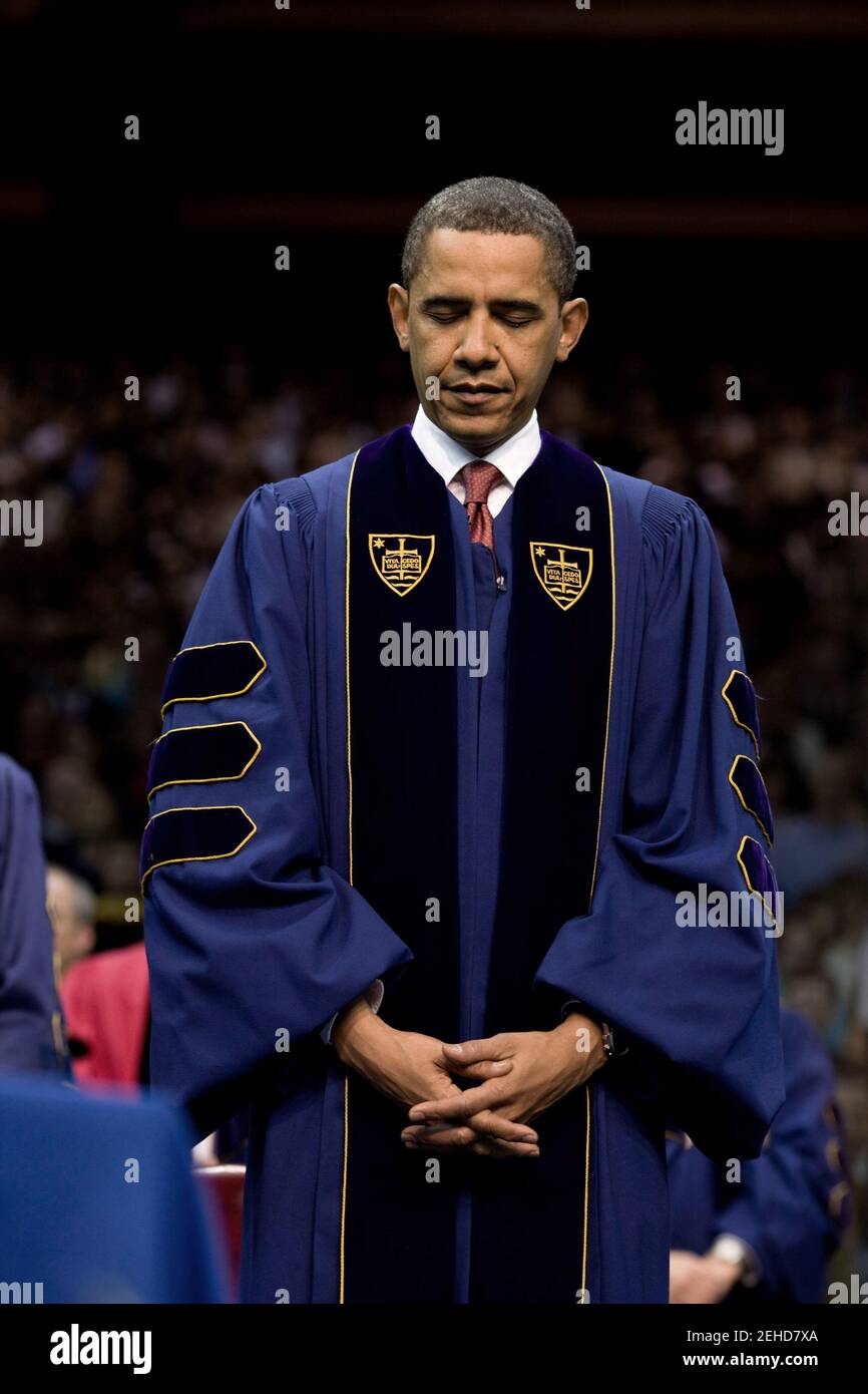 President Barack Obama bows his head at the University of Notre Dame's ...