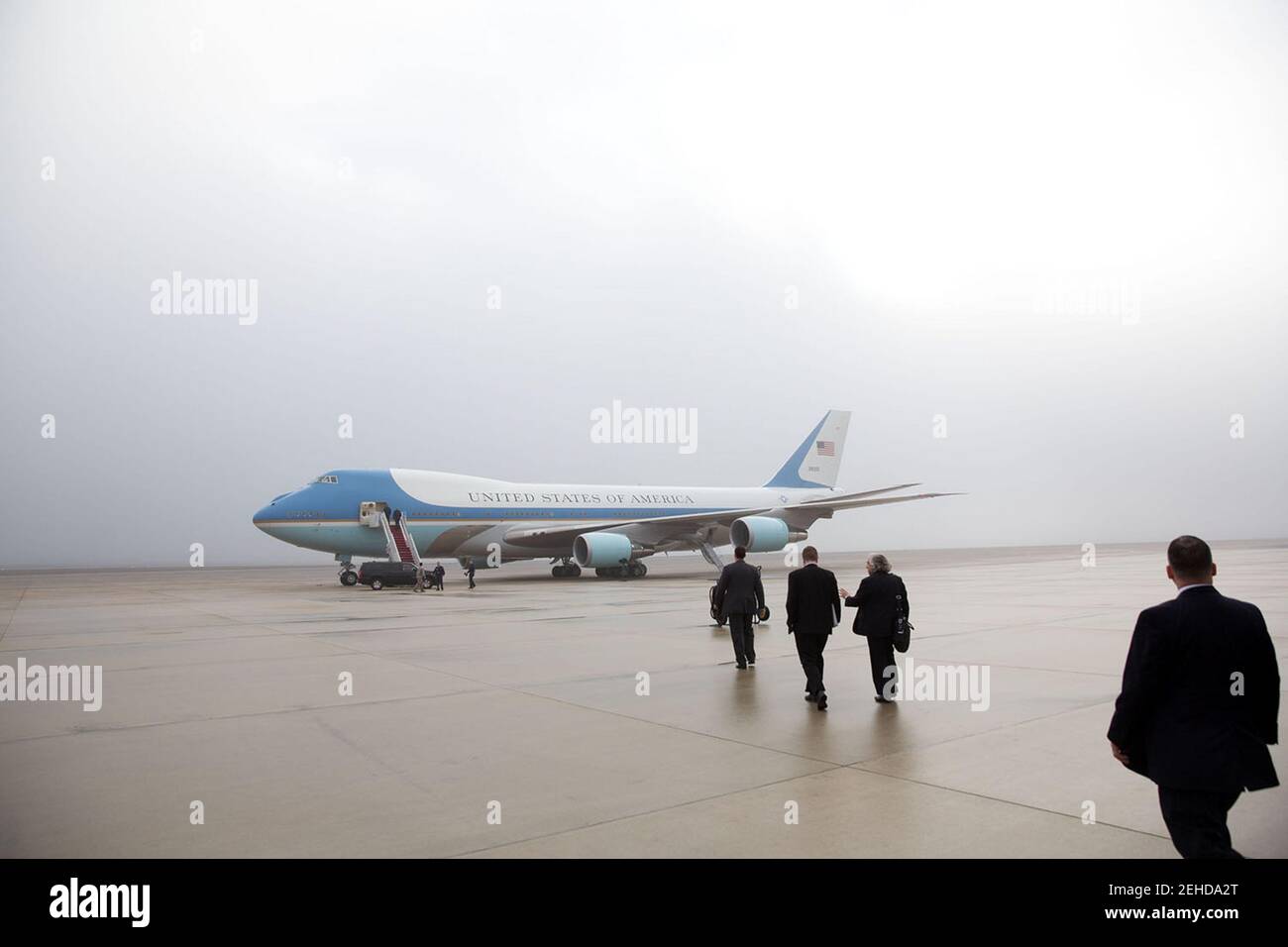Energy Secretary Ernest Moniz and others walk to Air Force One at Joint ...