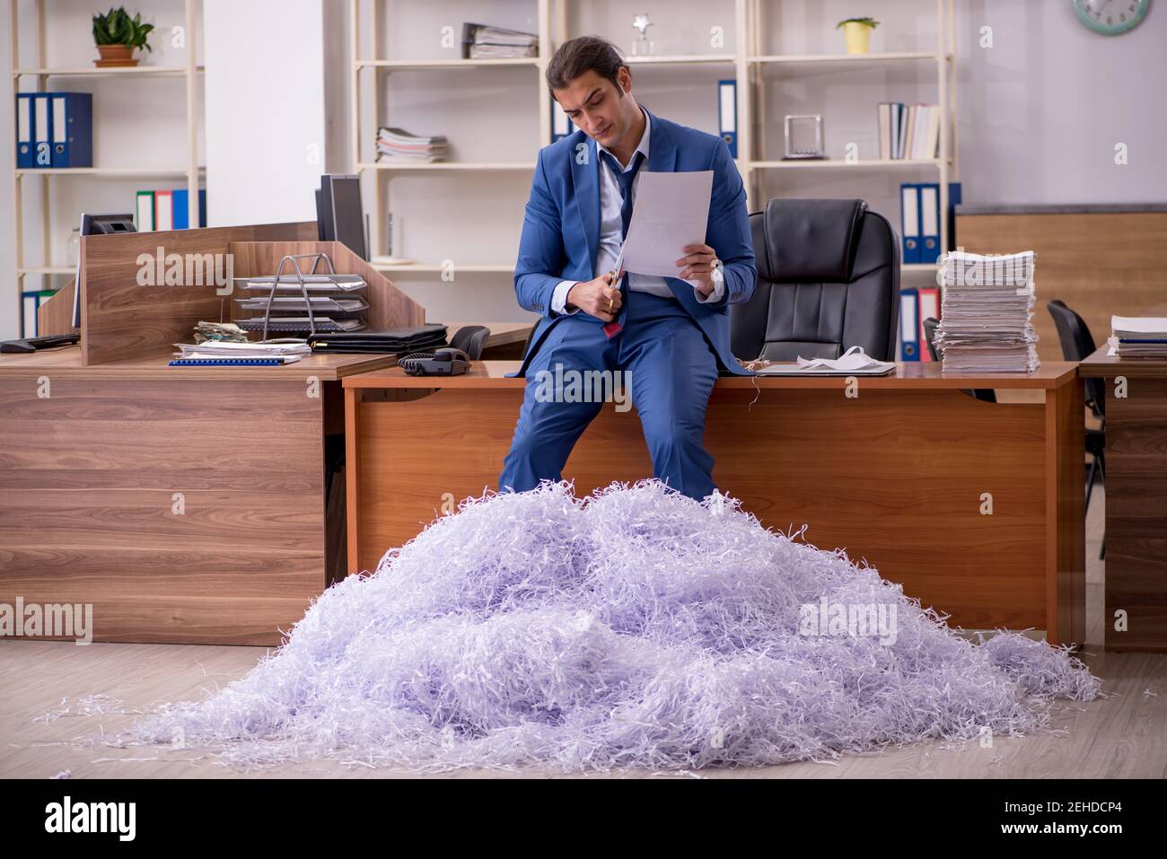 Paper shredder employee hi-res stock photography and images - Alamy