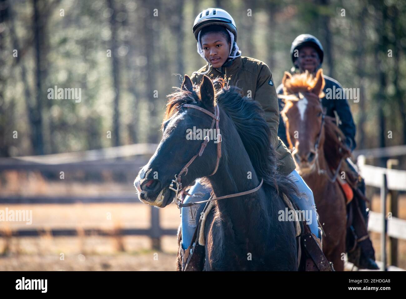 Two teenagers riding horseback in ring, Hope Riders, Brandywine, MD ...