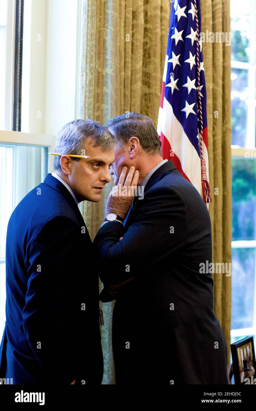 National Security Advisor Gen. James Jones, right, confers with NSC ...