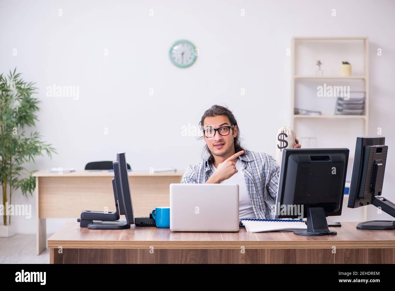 Male it specialist working in the office Stock Photo - Alamy