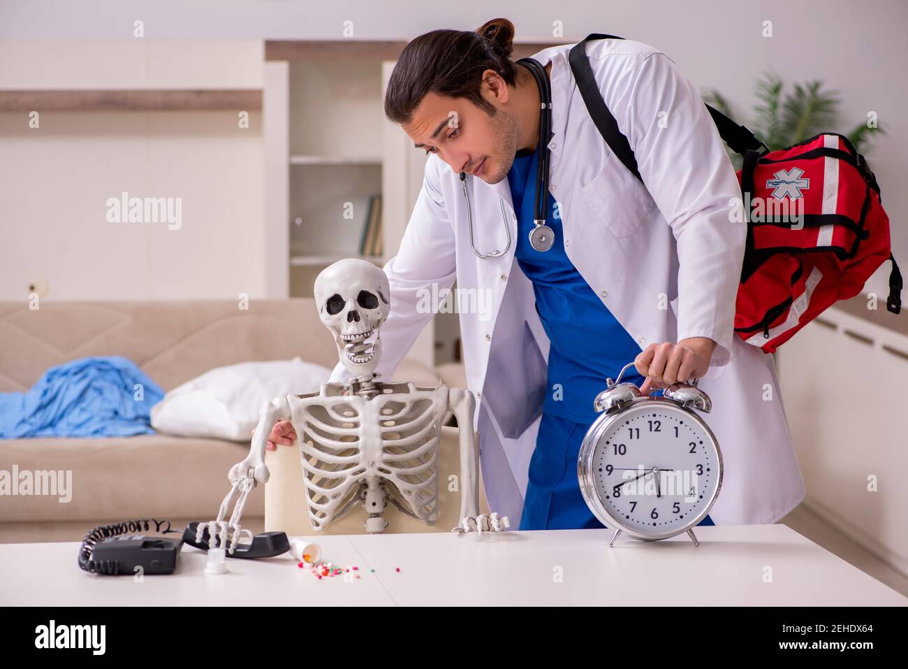 Male paramedic visiting skeleton patient Stock Photo - Alamy