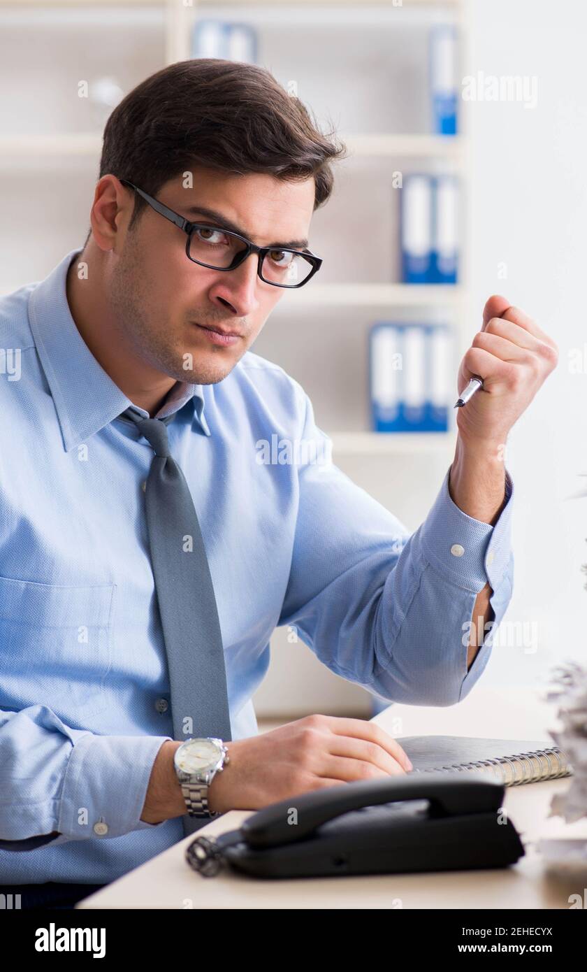 The extremely busy businessman working in office Stock Photo - Alamy