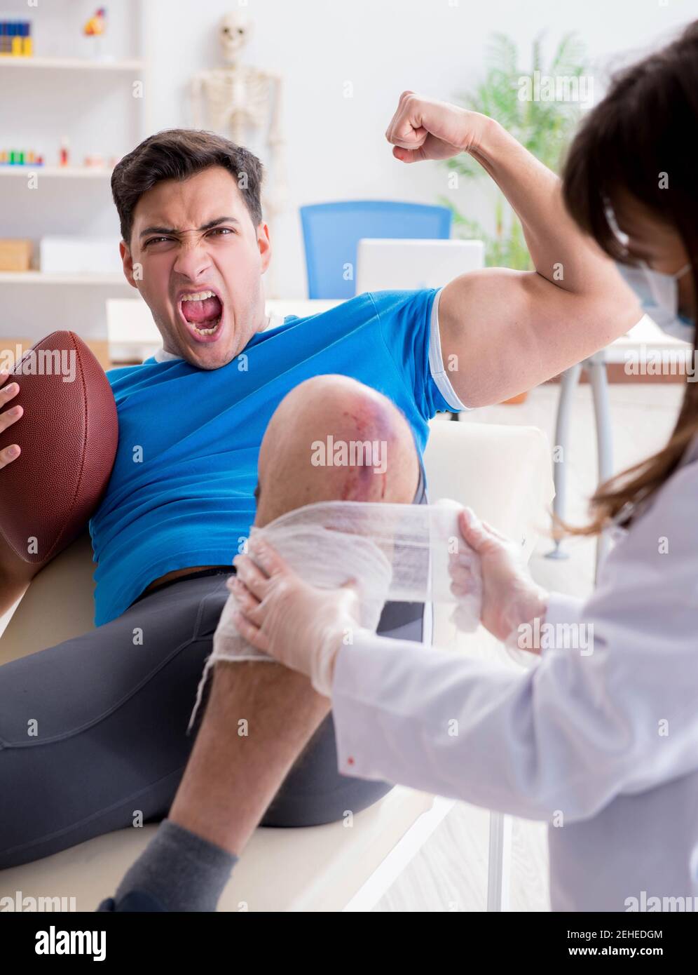 The american football player with injury visiting doctor Stock Photo ...