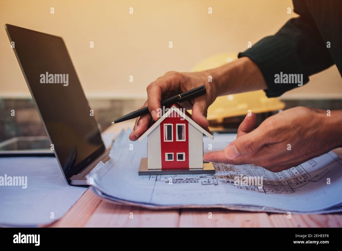 Engineer design planning house building project by computer laptop ...