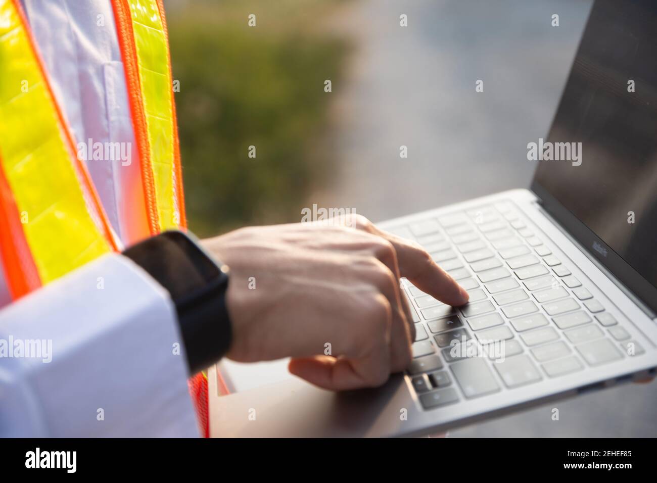 Worker Engineer work outdoor by computer laptop technology Stock Photo ...