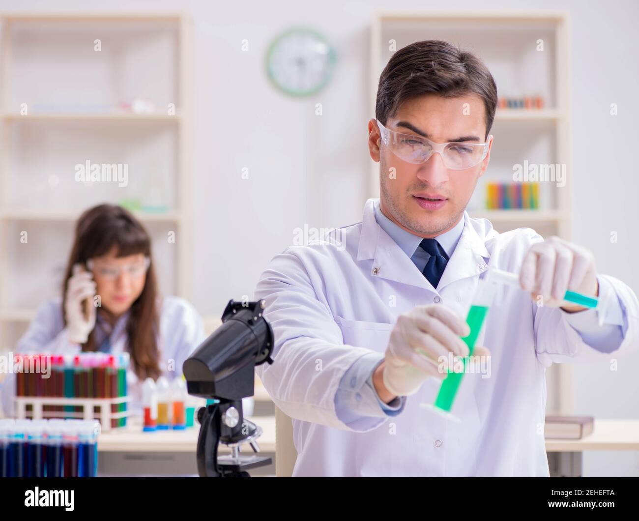 Two chemical substance mixing in hi-res stock photography and images ...