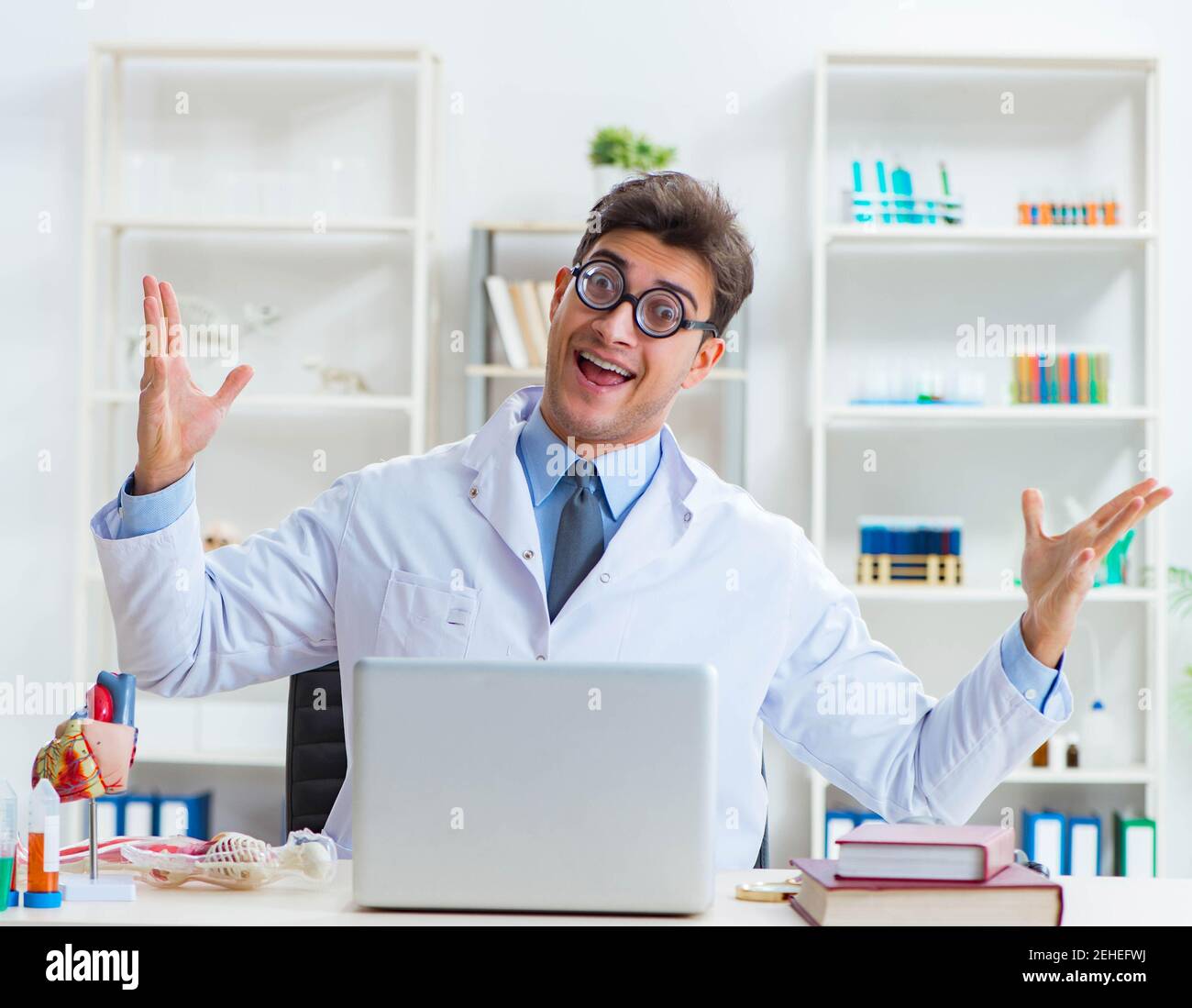 The funny doctor having fun in hospital lab Stock Photo - Alamy