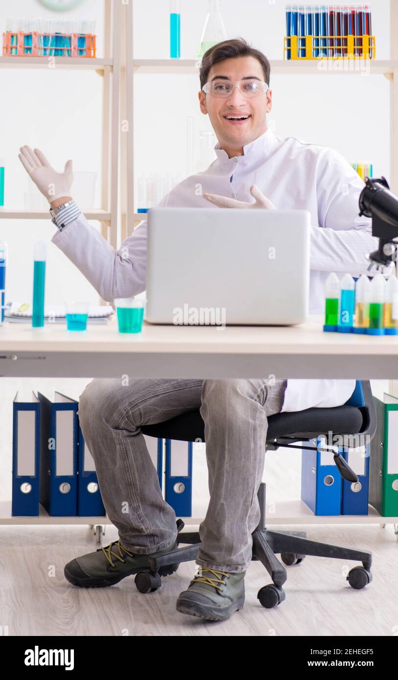 The man student working in chemical lab on experiment Stock Photo - Alamy