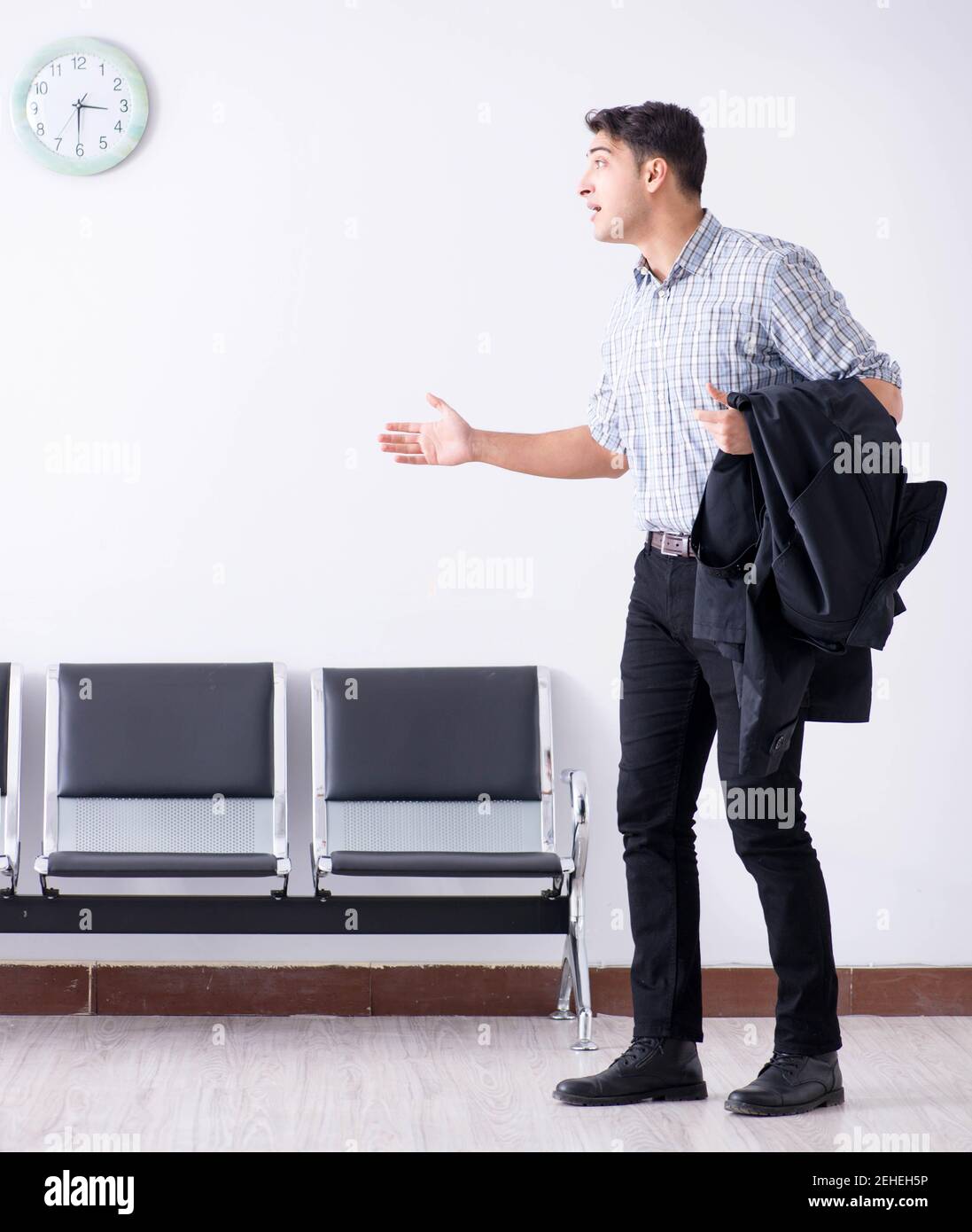 The man nervously impatiently waiting in the lobby Stock Photo - Alamy