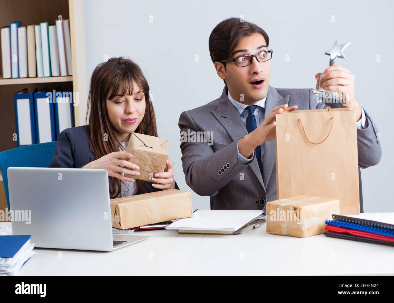 The business people receiving new mail and parcels Stock Photo - Alamy