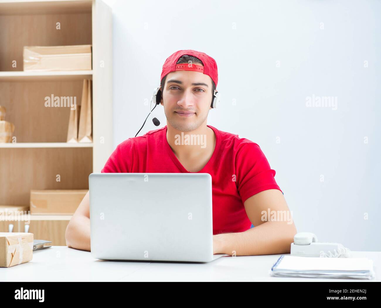 The call center worker at parcel distribution center in post office ...