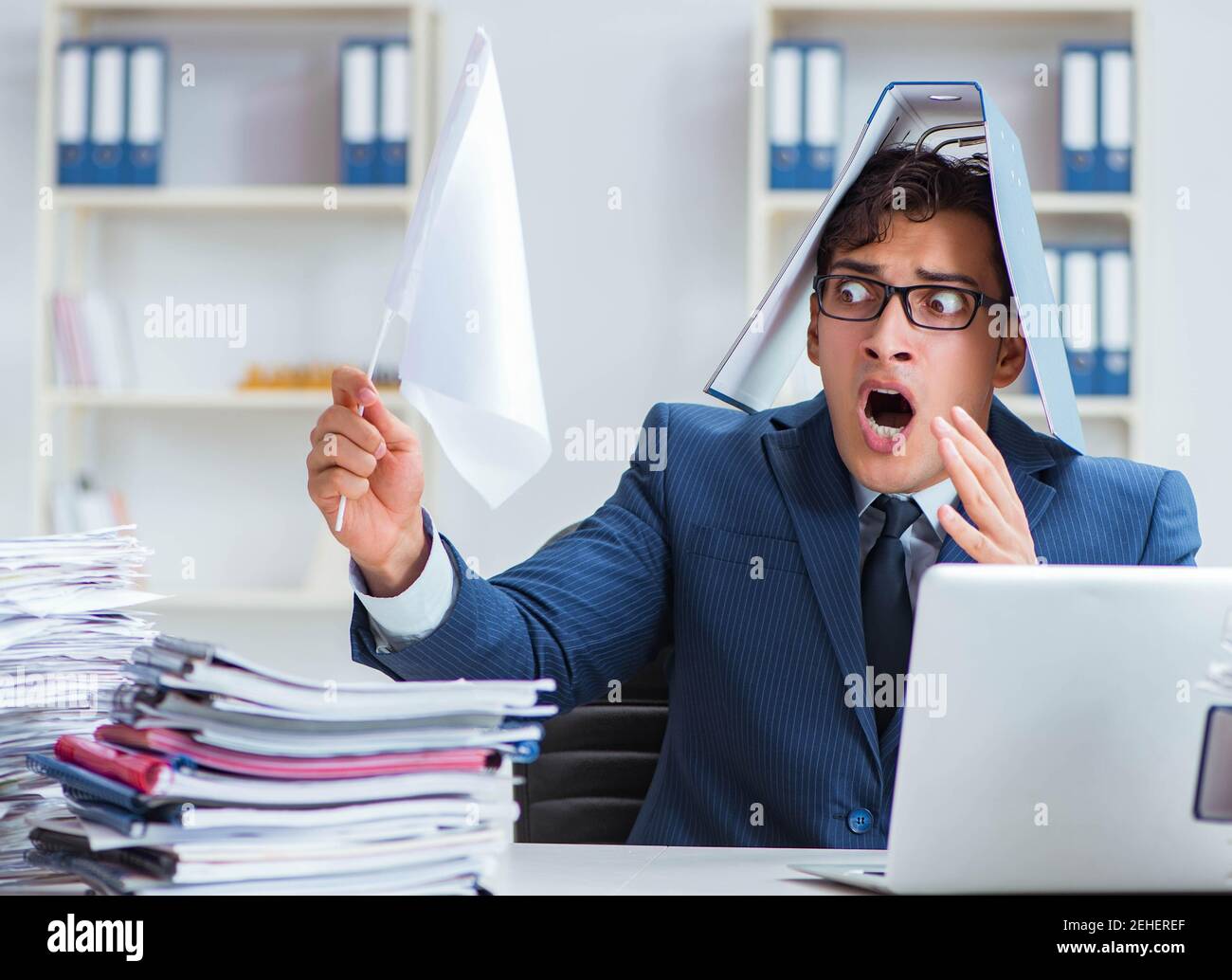The businessman throwing white flag and giving up Stock Photo - Alamy