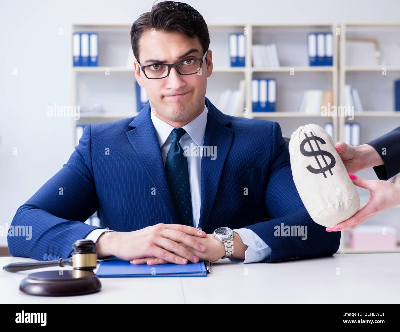 The judge in bribe concept with money Stock Photo - Alamy