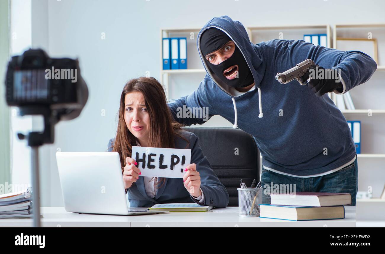 The criminal recording message for ransom with victim businesswoman ...