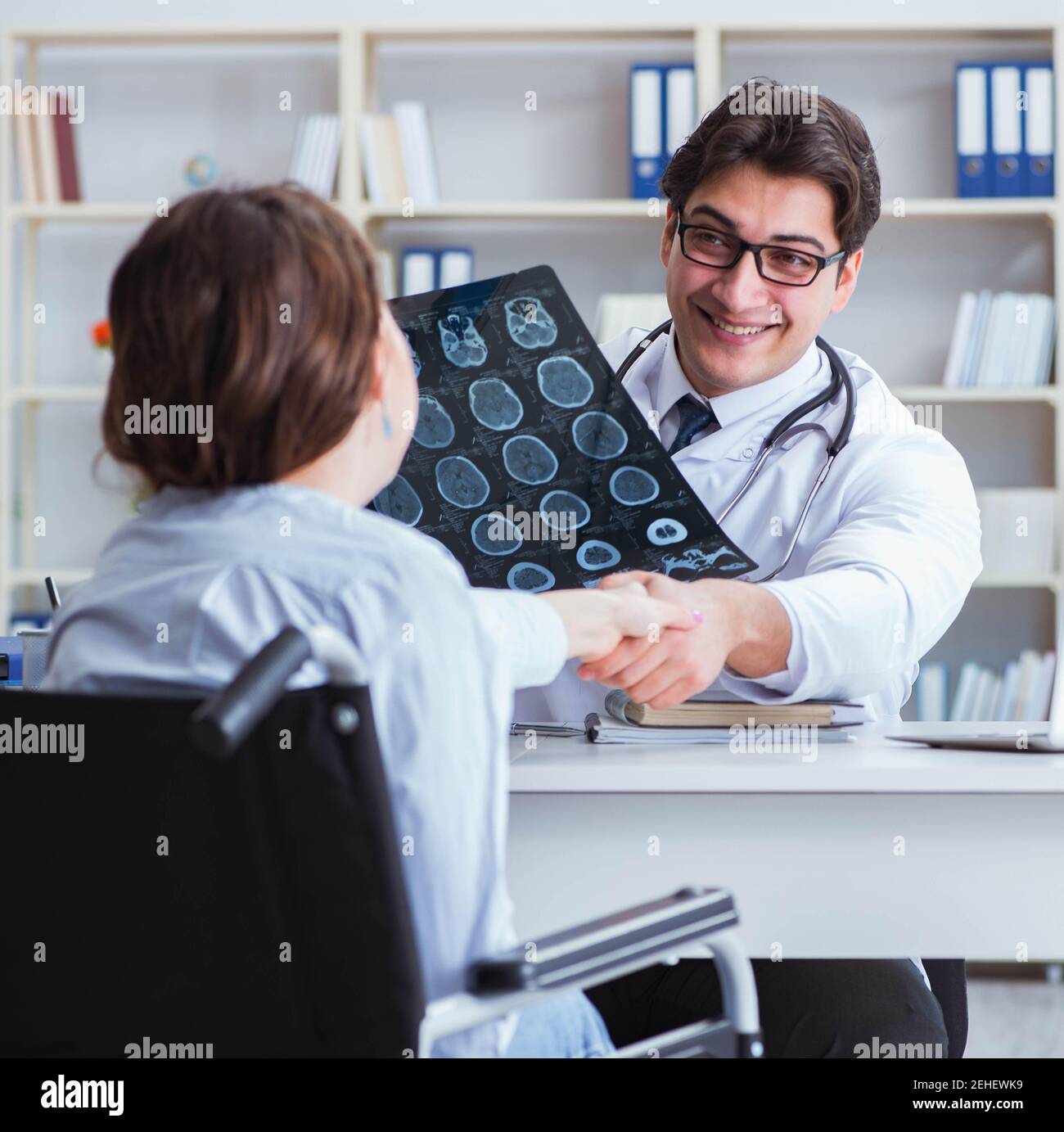 Doctor congratulating patient recovery hi-res stock photography and ...