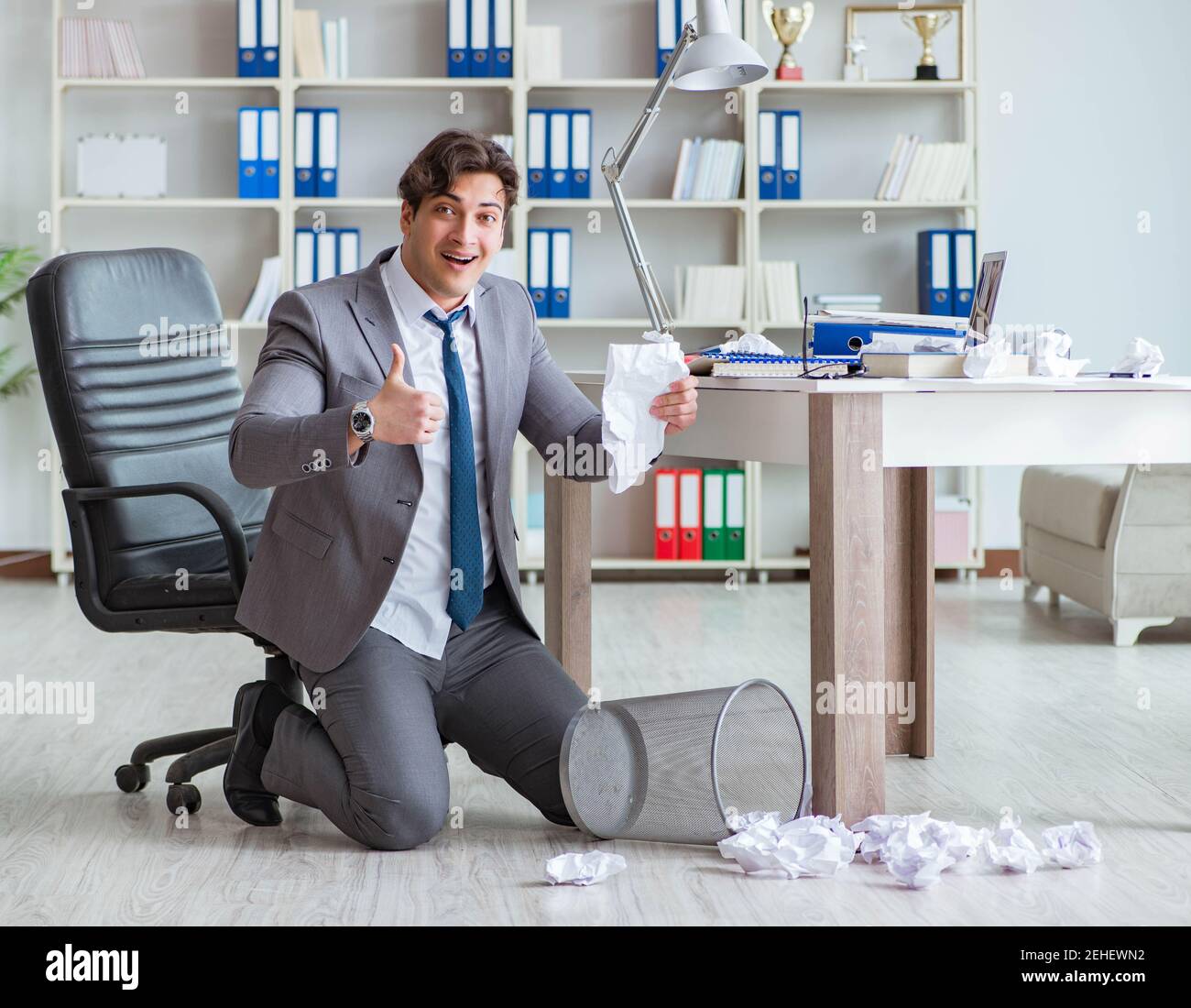 The businessman having fun taking a break in the office at work Stock ...