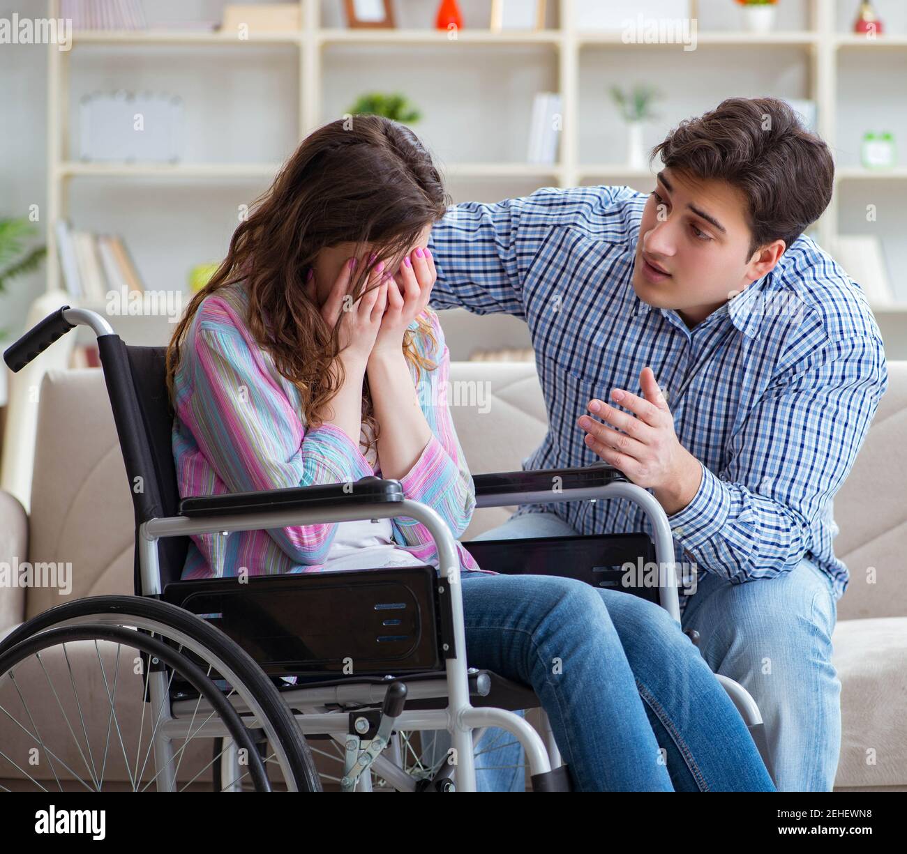 The desperate disabled person on wheelchair Stock Photo - Alamy