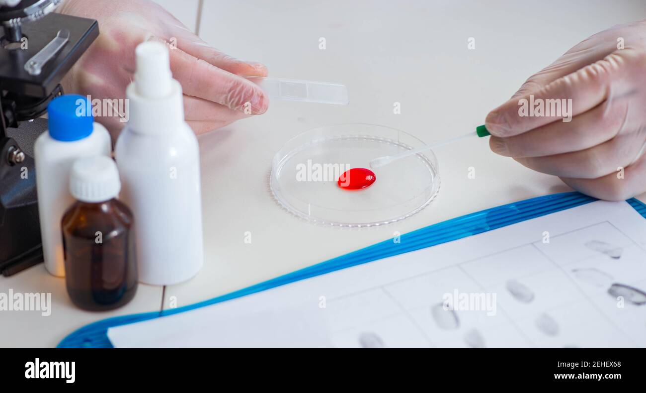The drug synthesis lab experimentnig with pills Stock Photo - Alamy