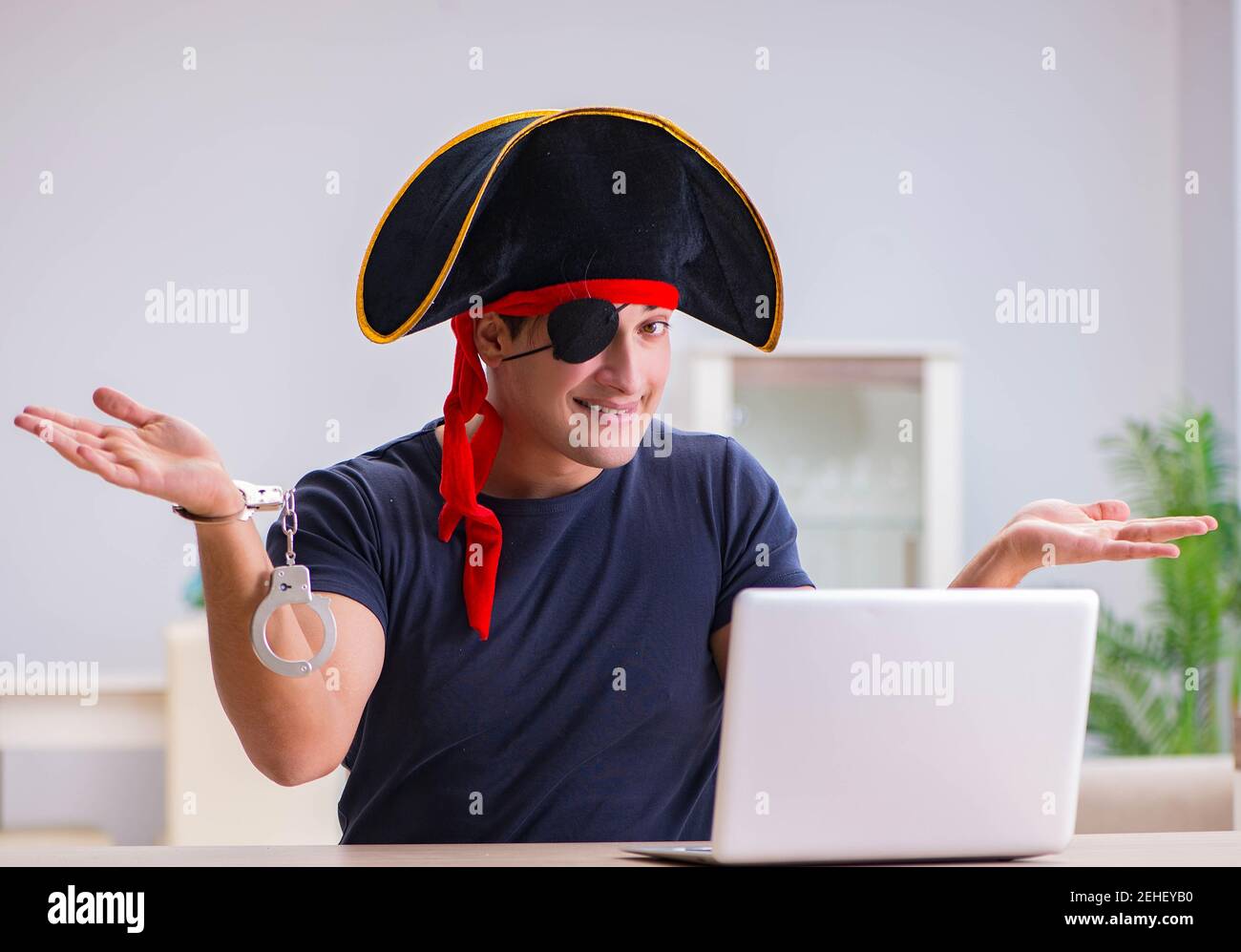 The digital security concept with pirate at computer Stock Photo - Alamy