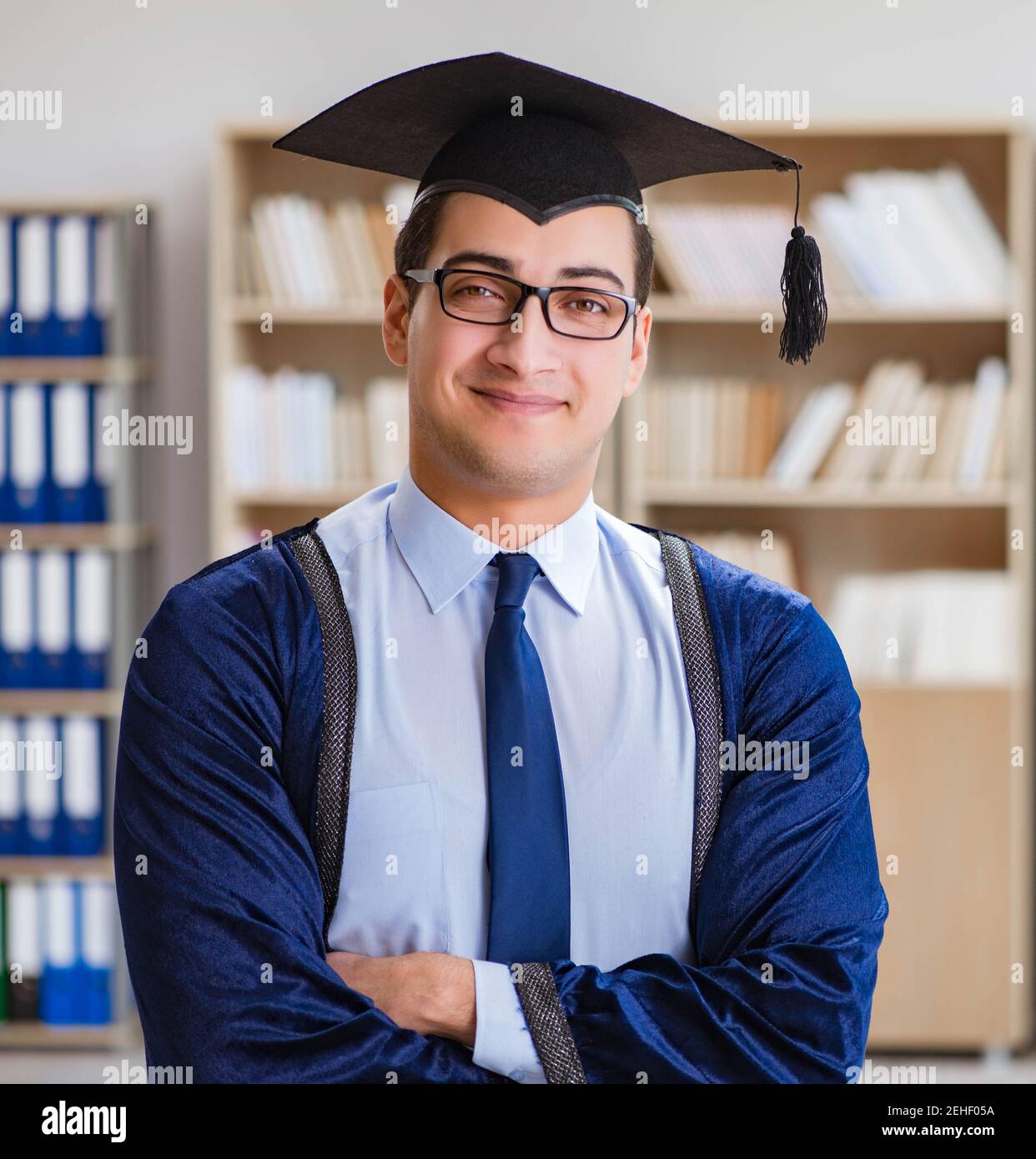 The young man graduating from university Stock Photo - Alamy