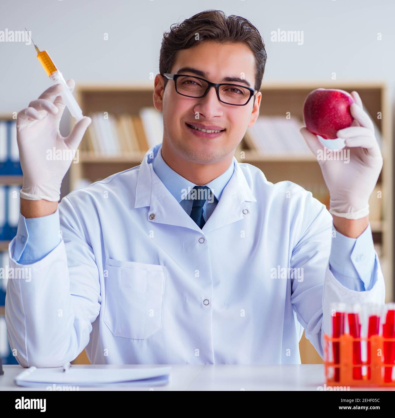 The scientist working on organic fruits and vegetables Stock Photo - Alamy
