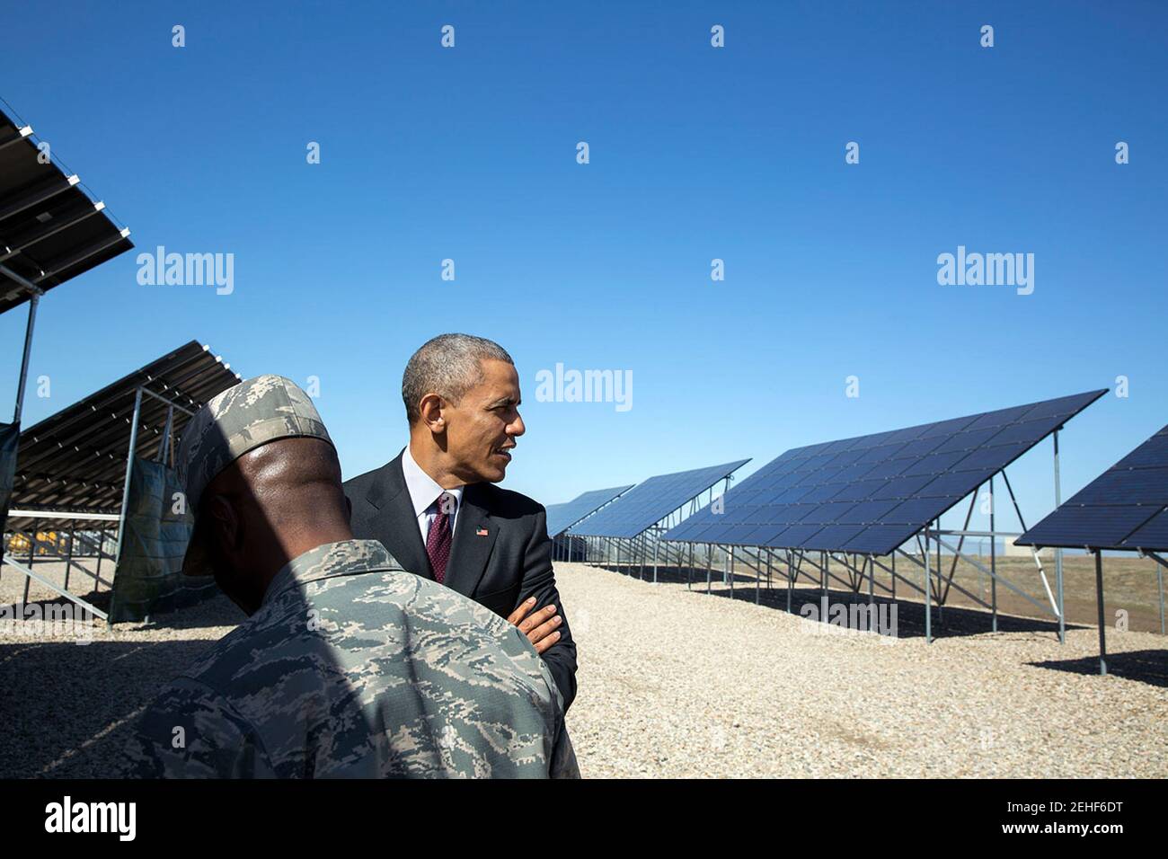 President Barack Obama takes a tour of solar panels with Col. Ronald E ...