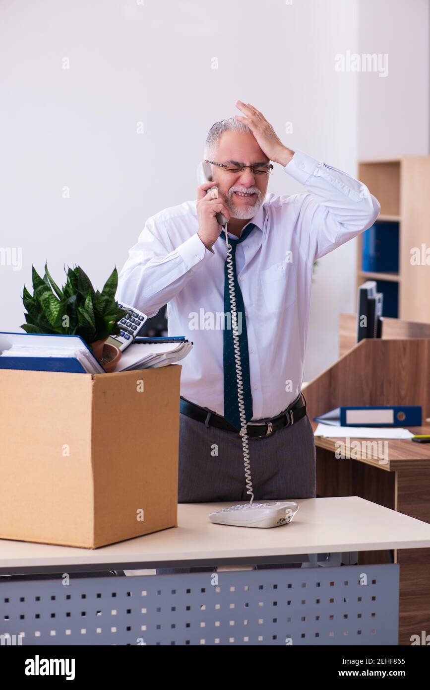 Old employee being fired from his work Stock Photo - Alamy