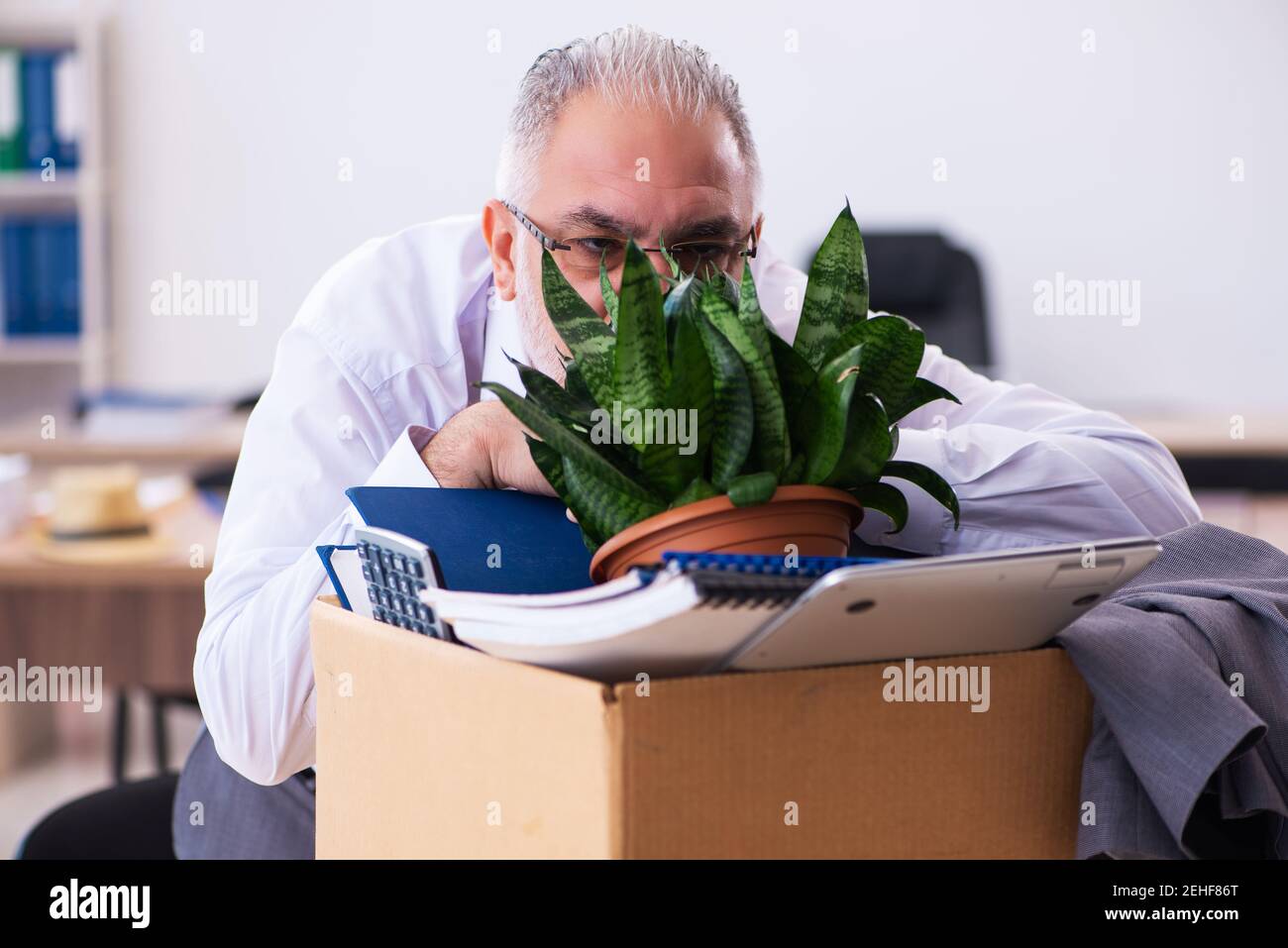 Old employee being fired from his work Stock Photo - Alamy