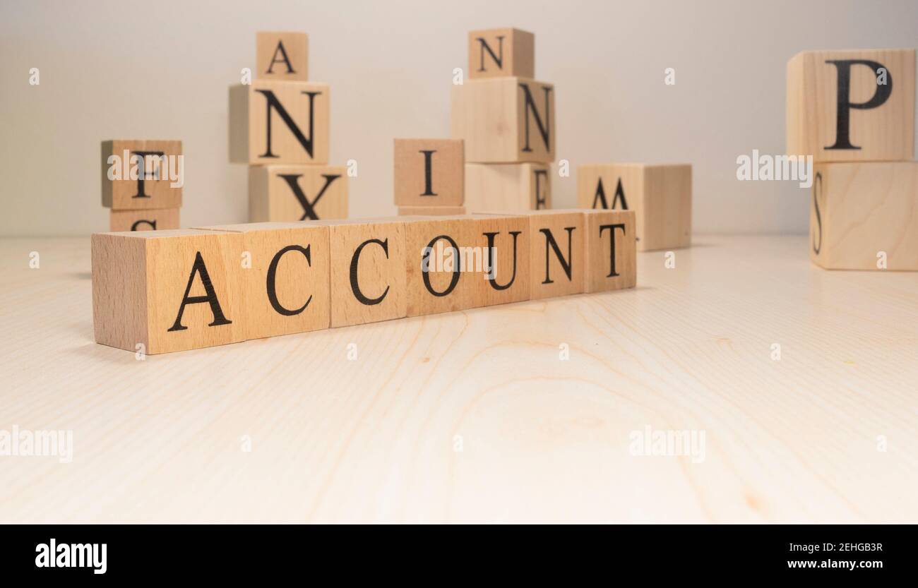 The word account is from wooden cubes. Background from wooden letters ...