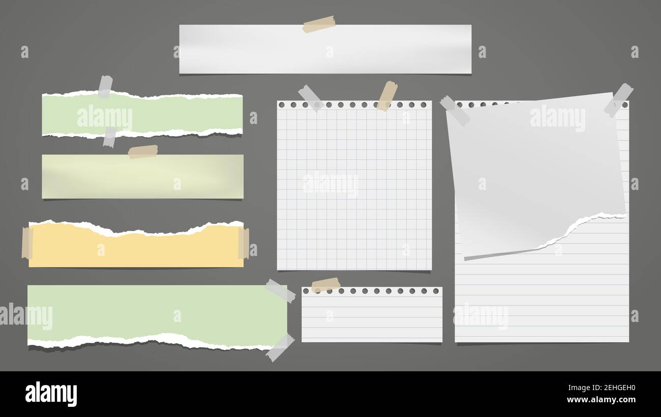 White torn, lined and green note, notebook paper are on dark grey ...