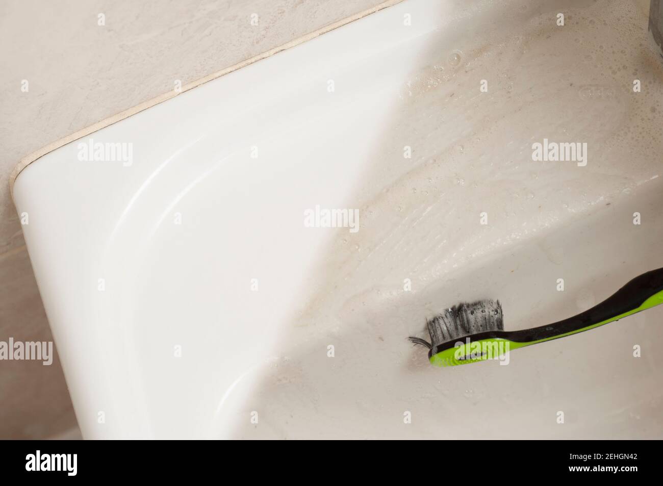 Illustrative example of using an effective detergent on a ceramic ...