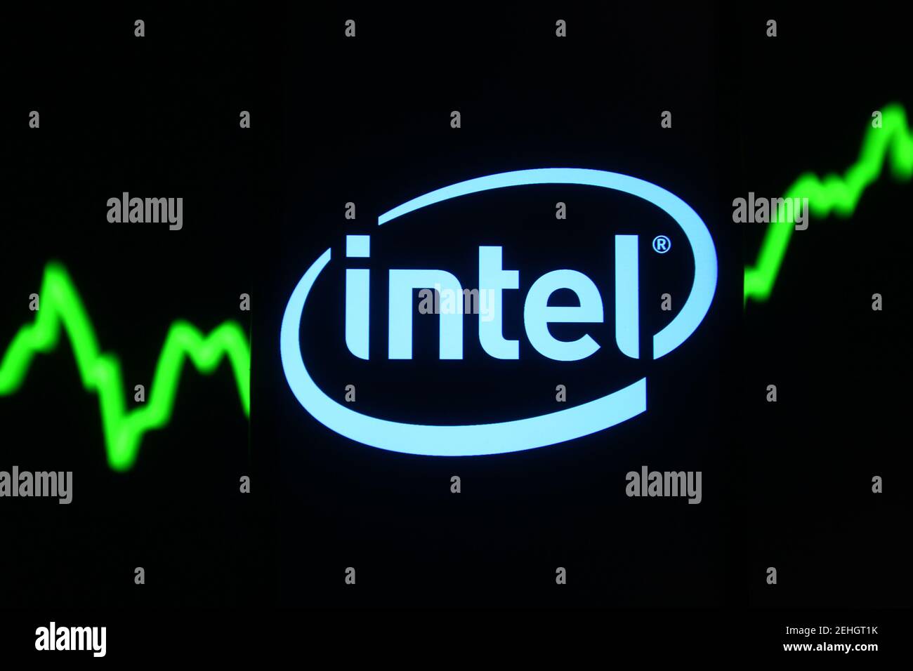 In this photo illustration an Intel logo is seen on a smartphone screen ...