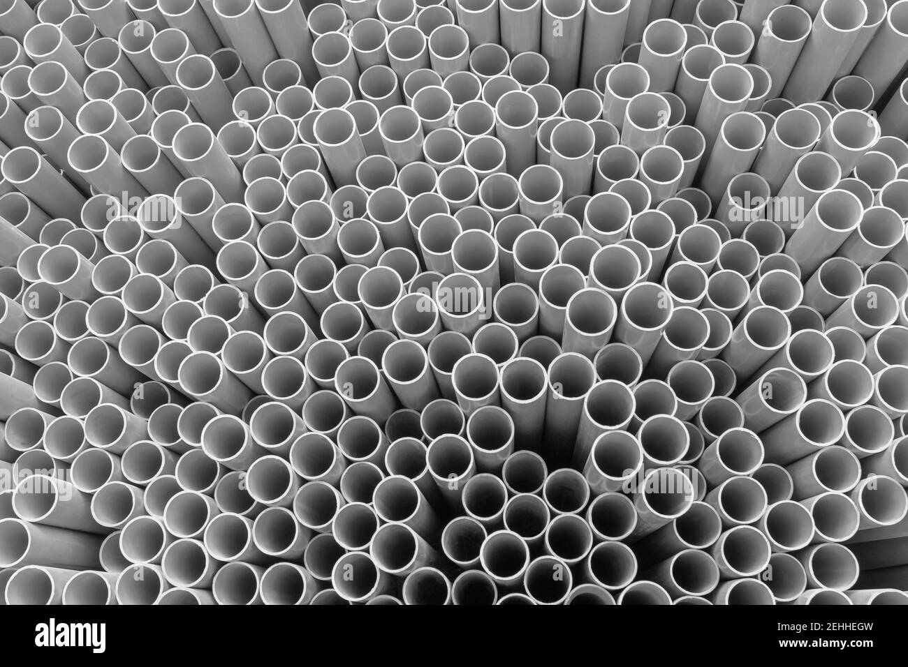 PVC pipes stacking on shelf in warehouse Stock Photo - Alamy