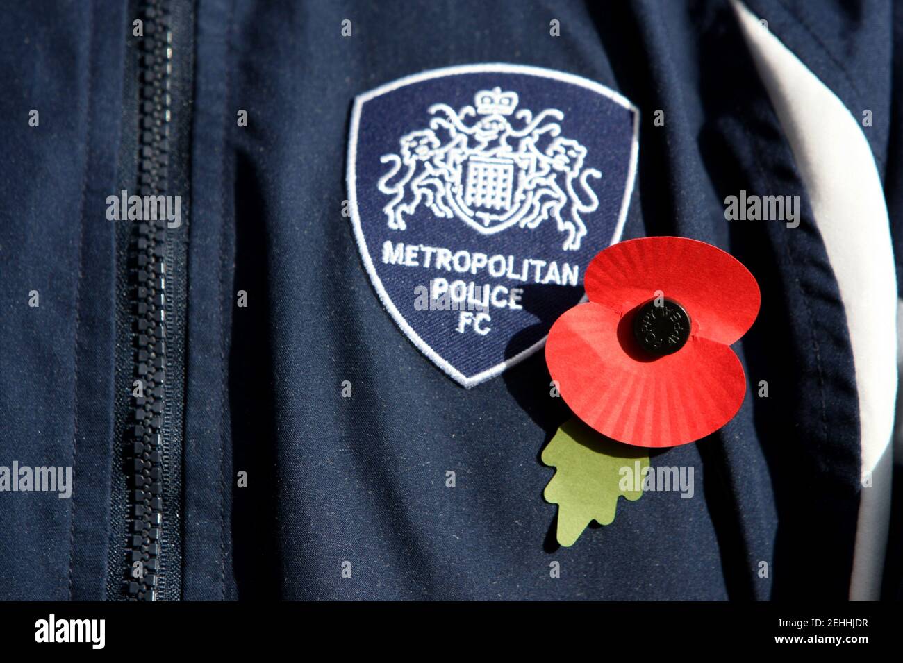 Football action poppy hi-res stock photography and images - Alamy