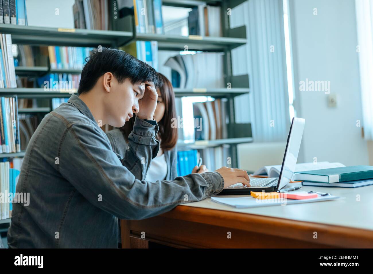Stressed students library hi-res stock photography and images - Alamy