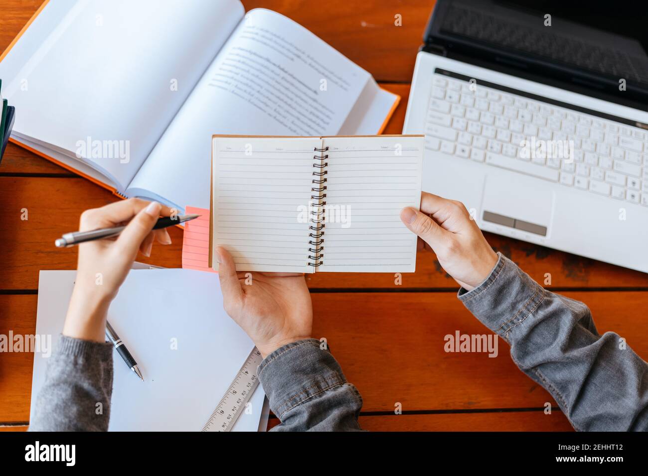 Young pupil desk doing hi-res stock photography and images - Alamy