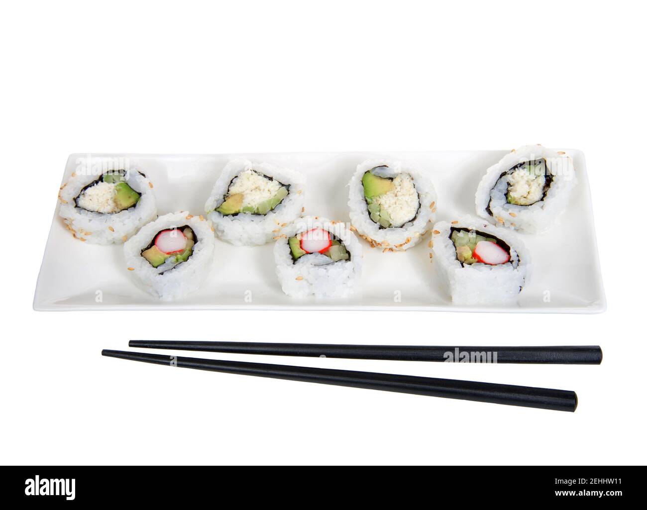 Close up top view of California rolls and crab roll sushi on a large ...