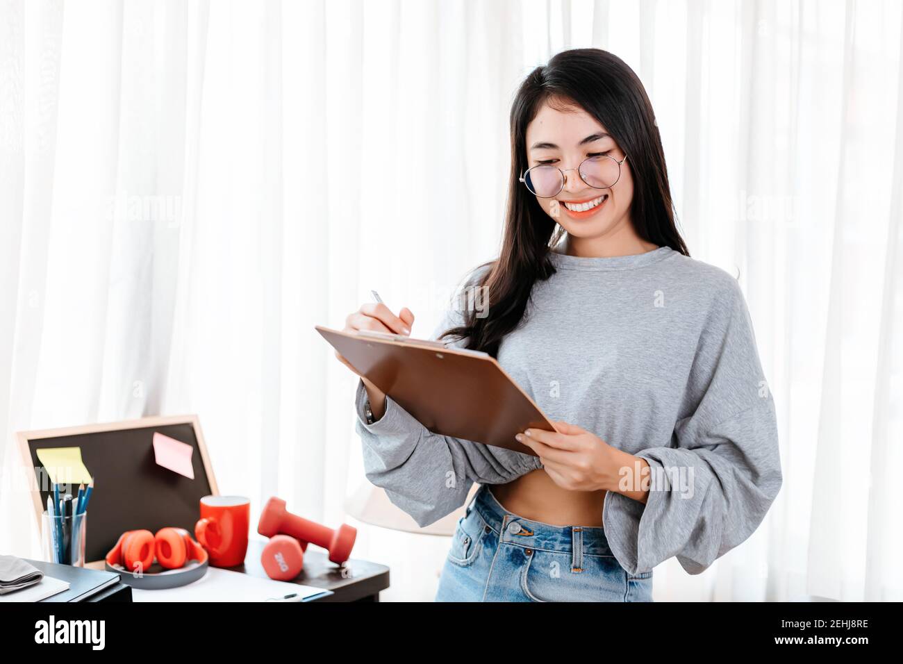 Student learning and hold pen for writing a note. Student learning at ...