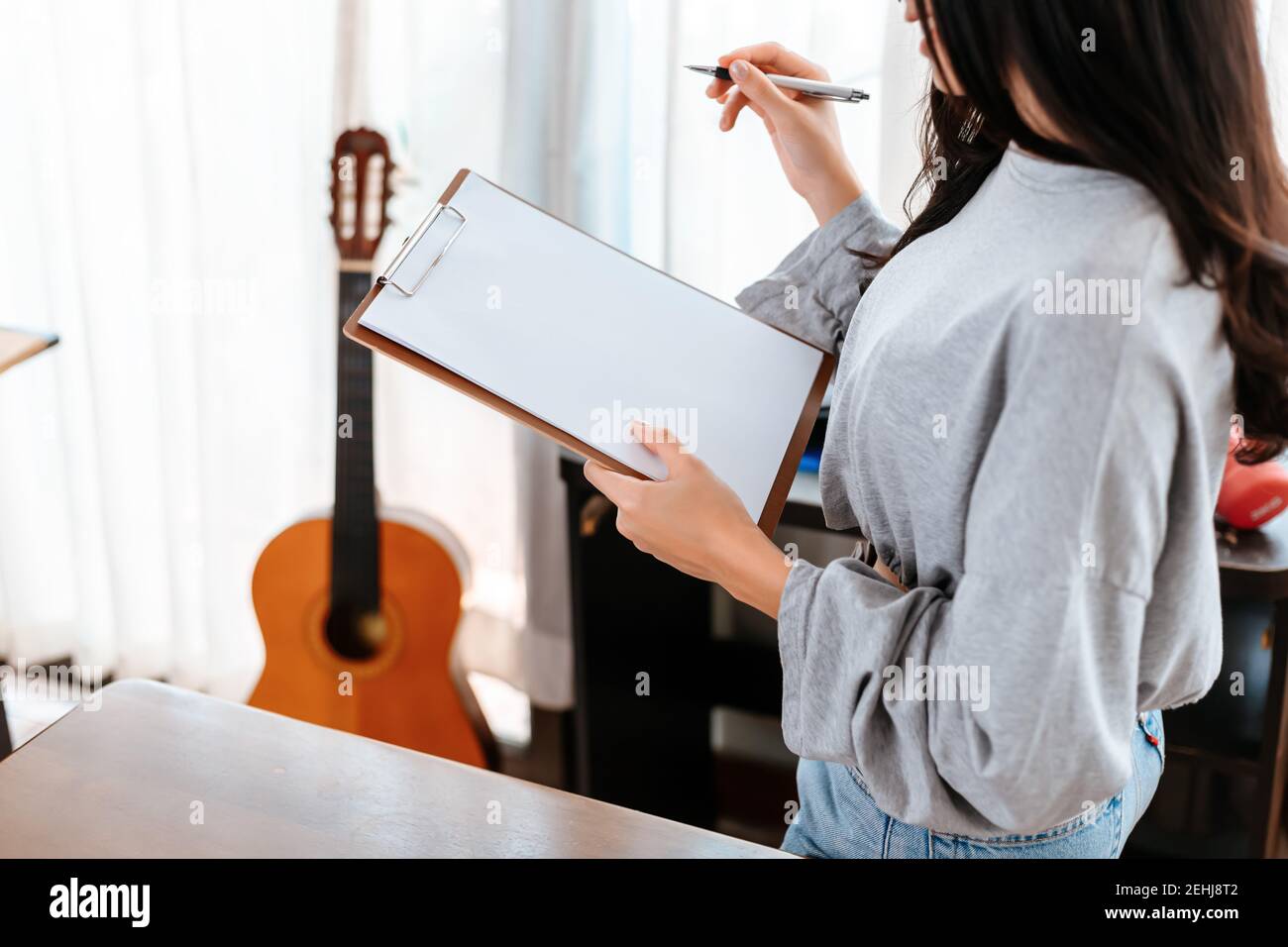 Student learning and hold pen for writing a note. Student learning at ...