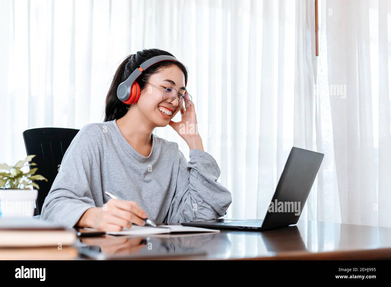 Student learning and hold pen for writing a note. Student learning at ...