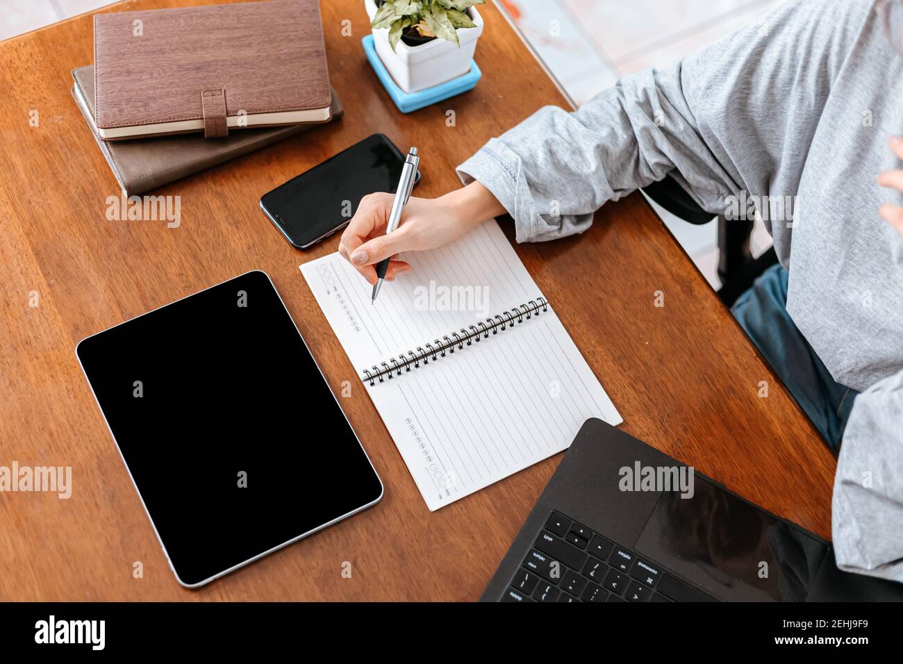 Student learning and hold pen for writing a note. Student learning at ...