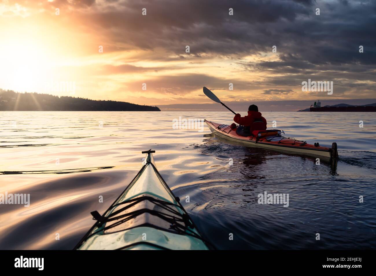 Adventurous Man Sea Kayaking in the Pacific Ocean Stock Photo - Alamy
