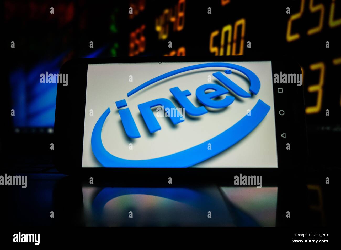 In this photo illustration an Intel logo is displayed on a smartphone ...