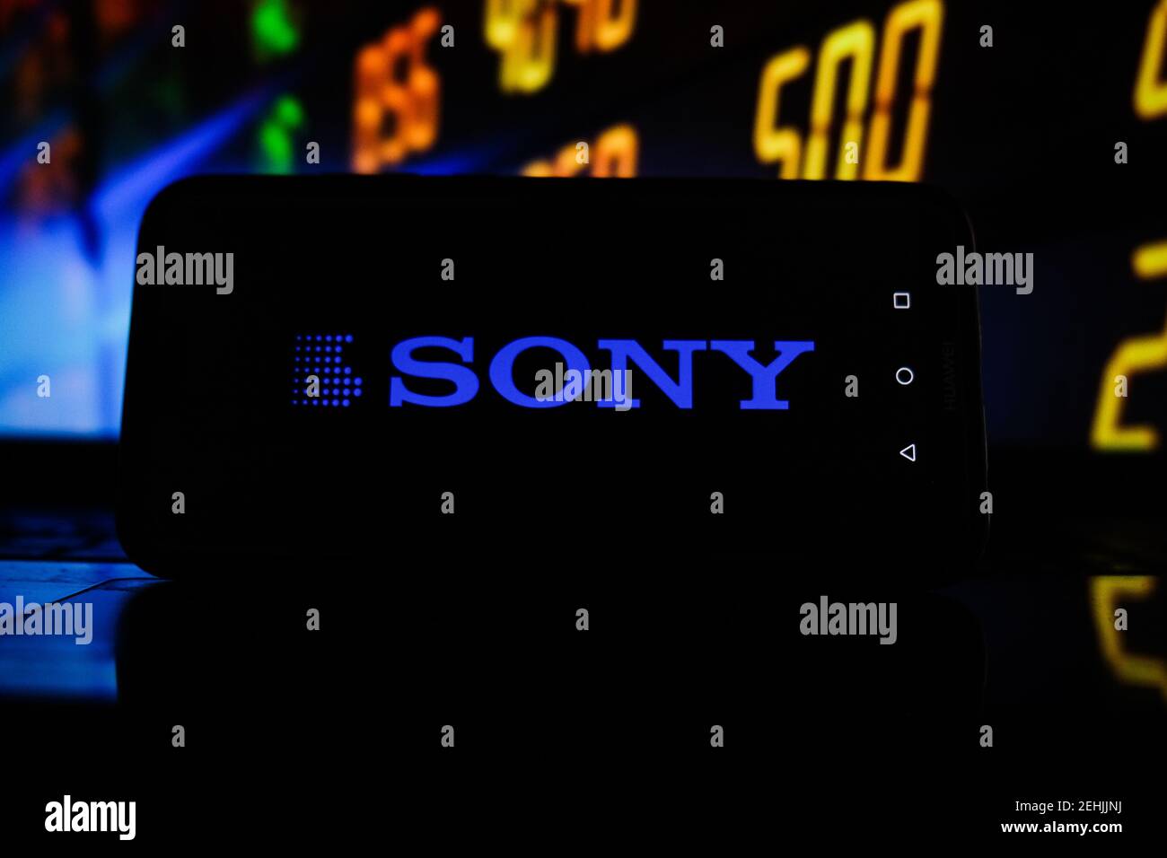 In this photo illustration a Sony logo seen displayed on a smartphone ...