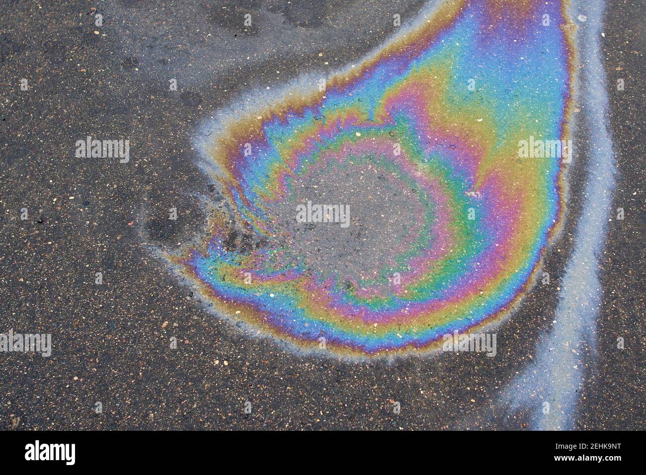 Abstract background with oil stain of oil products.Oil stain on Asphalt ...