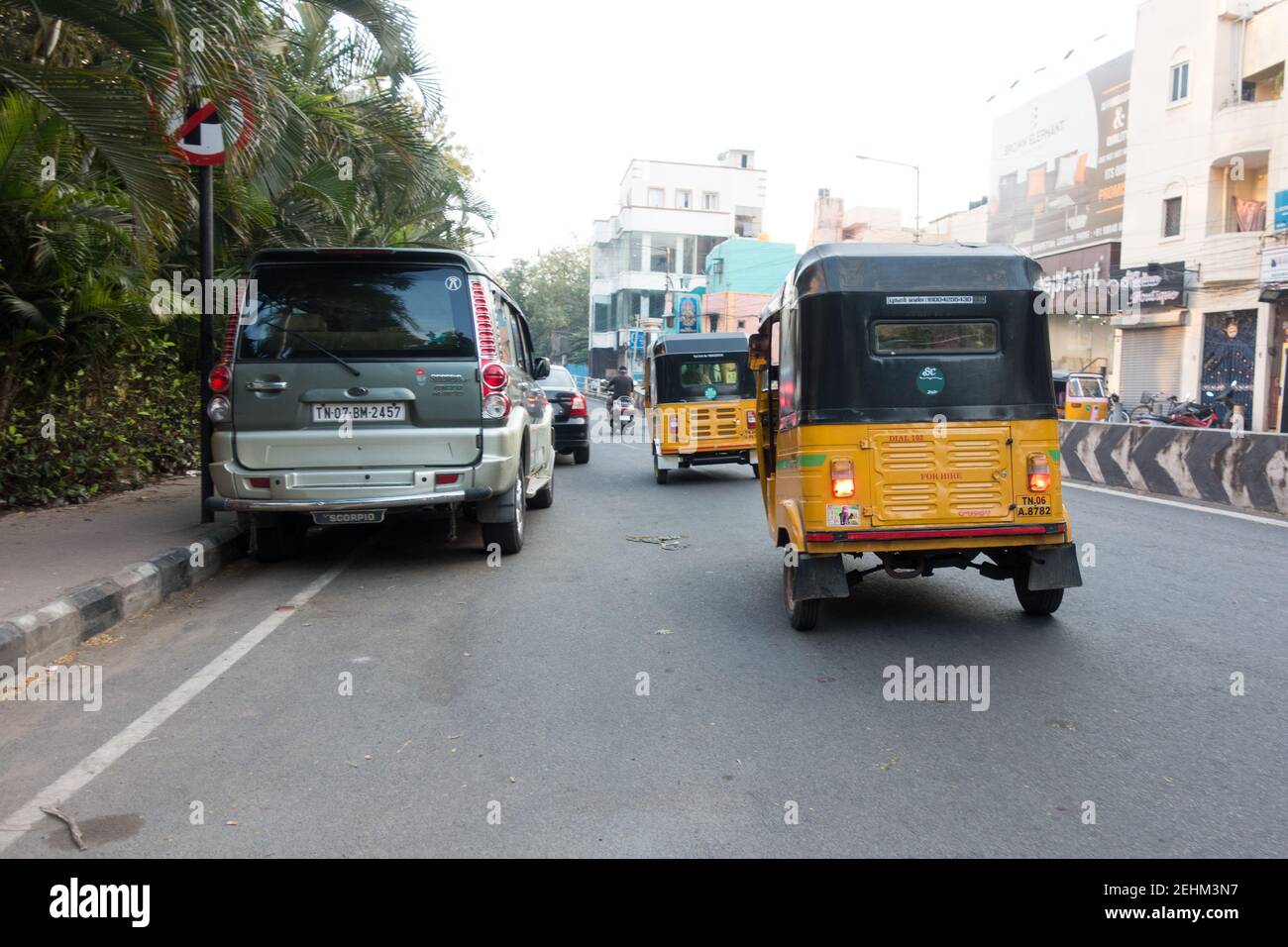 Yellow auto rickshaws hi-res stock photography and images - Alamy
