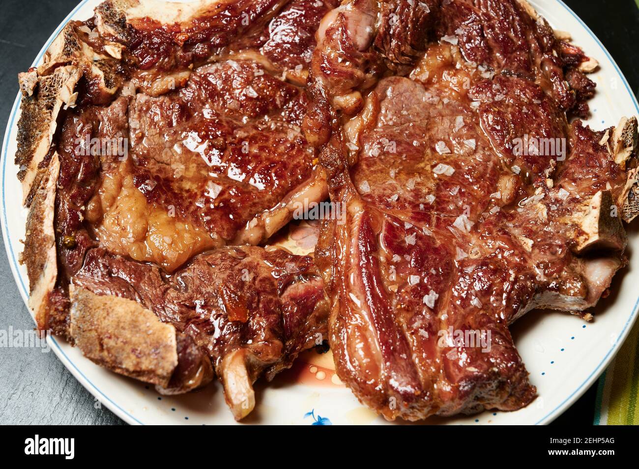 Beef chop with bone ready to eat Stock Photo - Alamy
