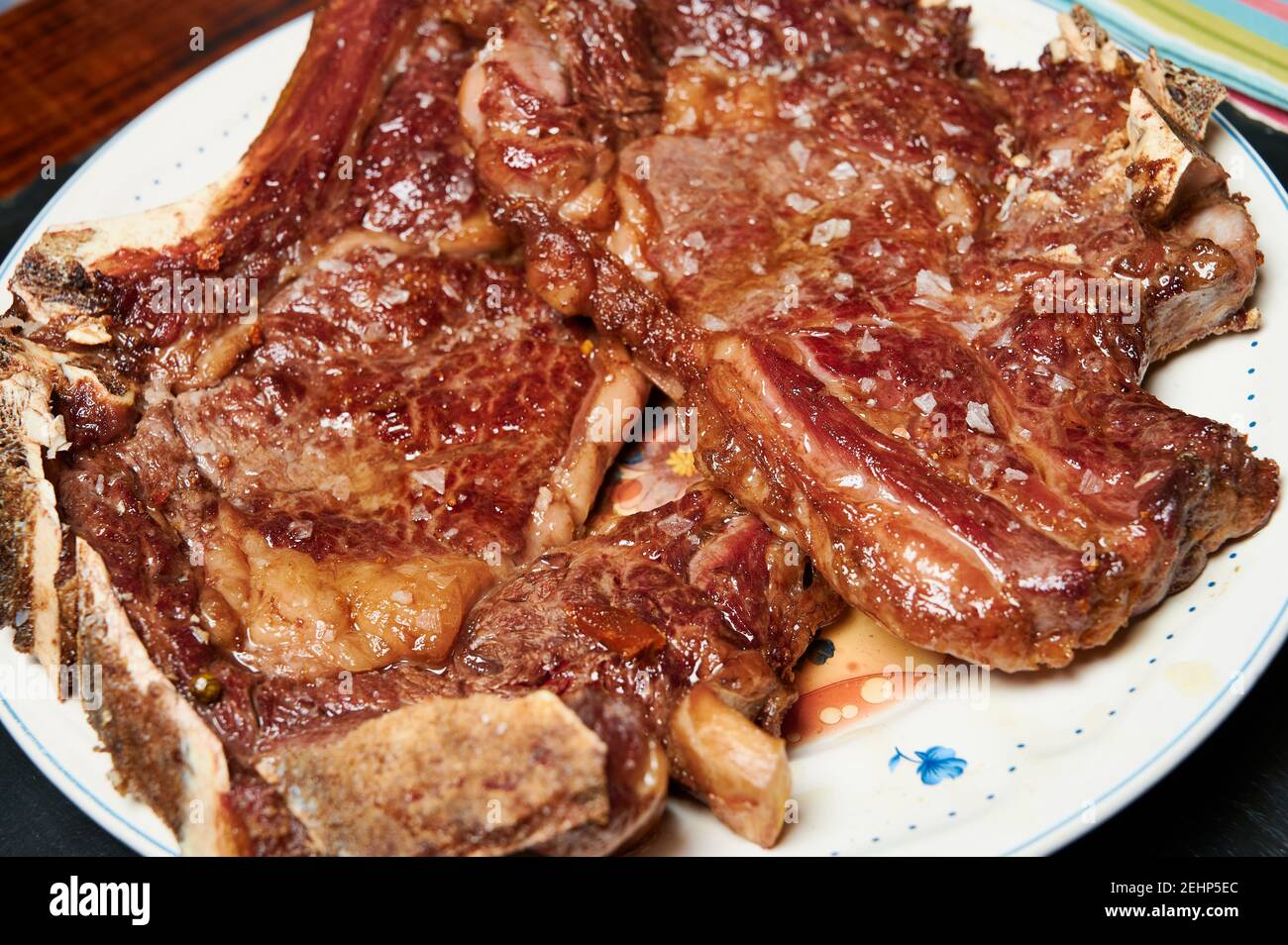 Beef chop with bone ready to eat Stock Photo - Alamy